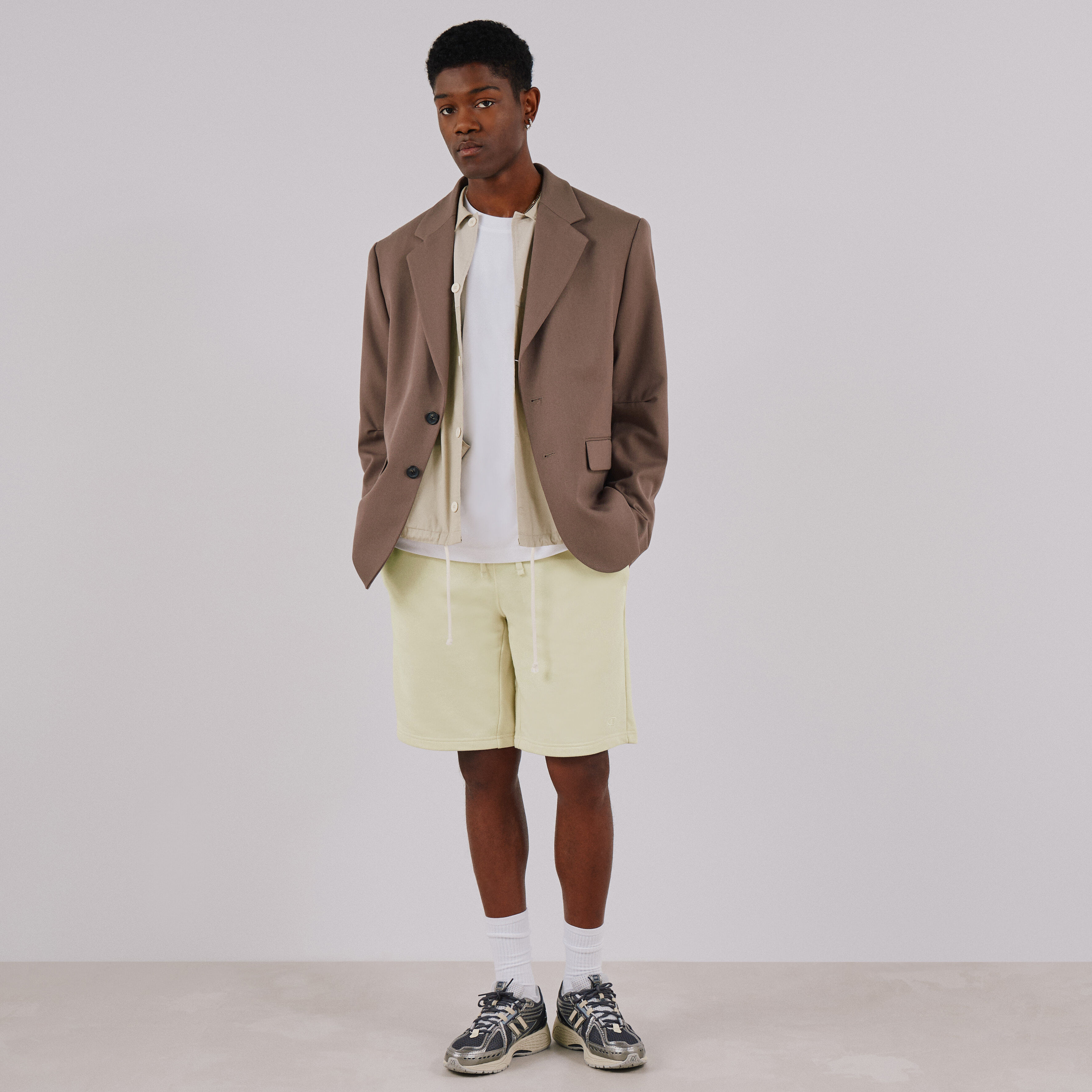 CHAMPION SHORT SMALL LOGO LEGACY BEIGE - SHORTS MEN | Courir.com