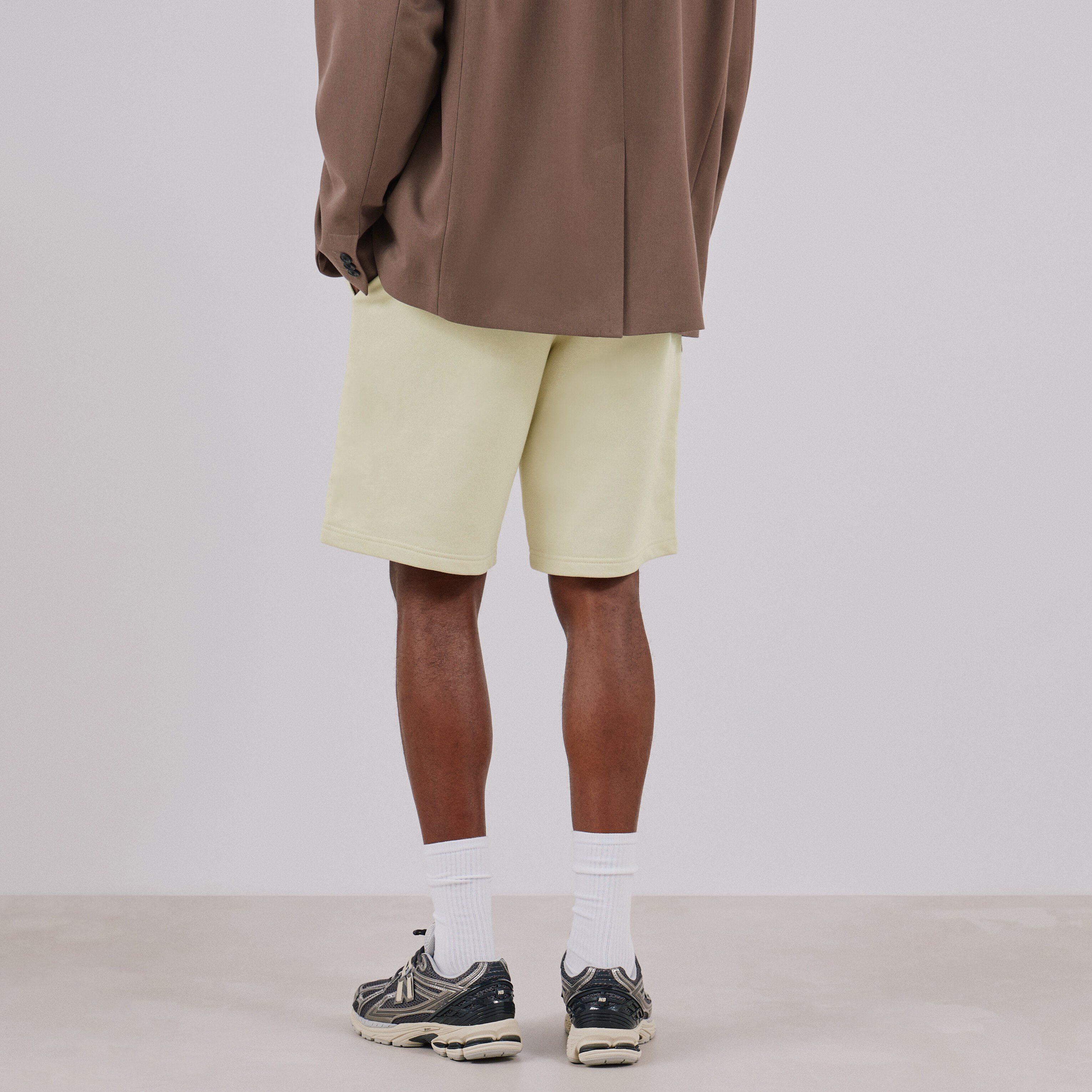 CHAMPION SHORT SMALL LOGO LEGACY BEIGE - SHORTS MEN | Courir.com